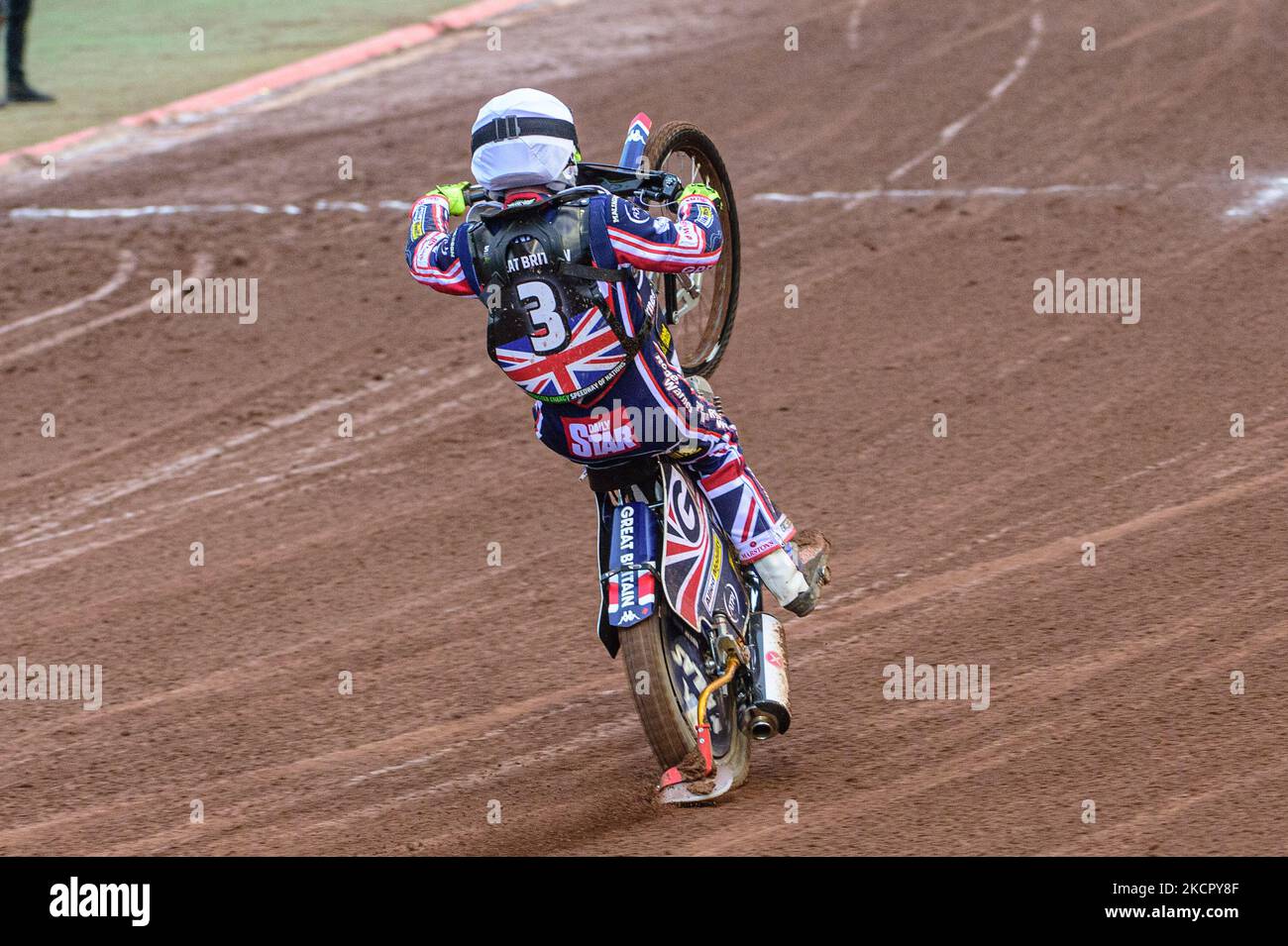 Tom Brennan of Great Britain celebrates with a wheelie during the ...
