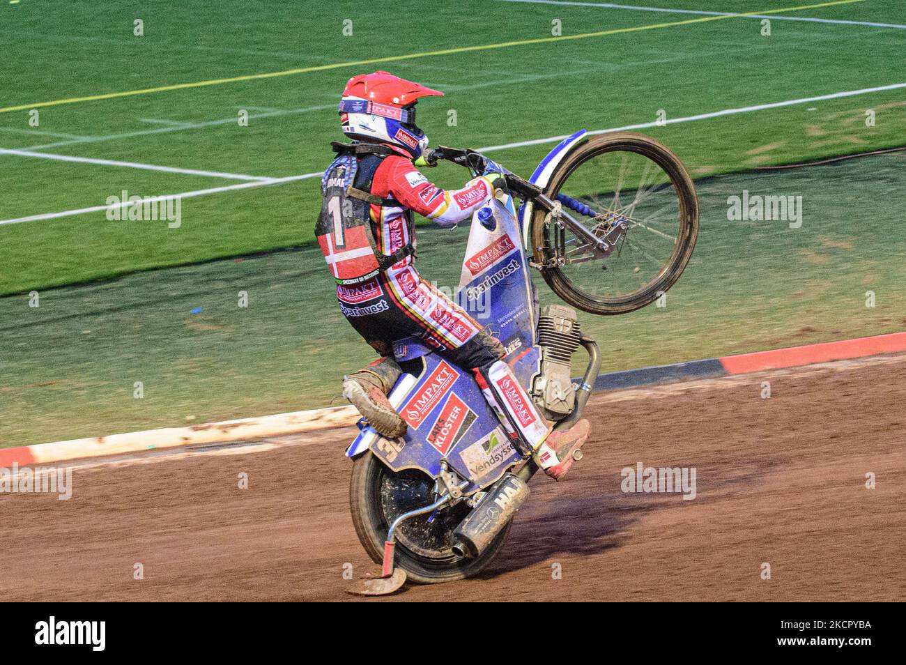 Leon Madsen of Denmark wheelies during the Monster Energy FIM Speedway ...
