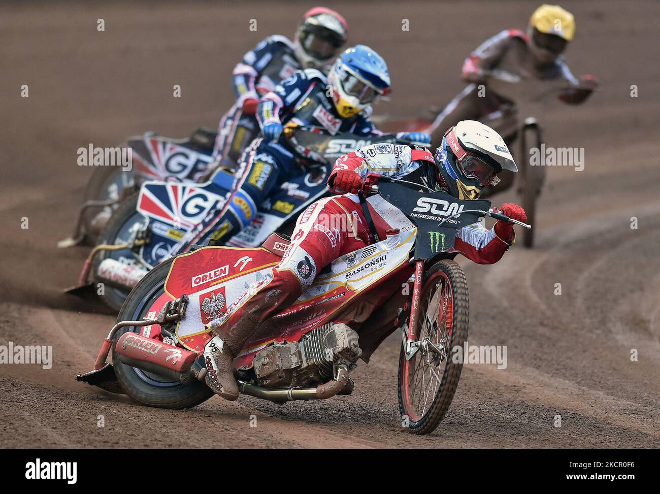 Bartosz Zmarzlik of Poland leads Robert Lambert of Great Britain abd ...