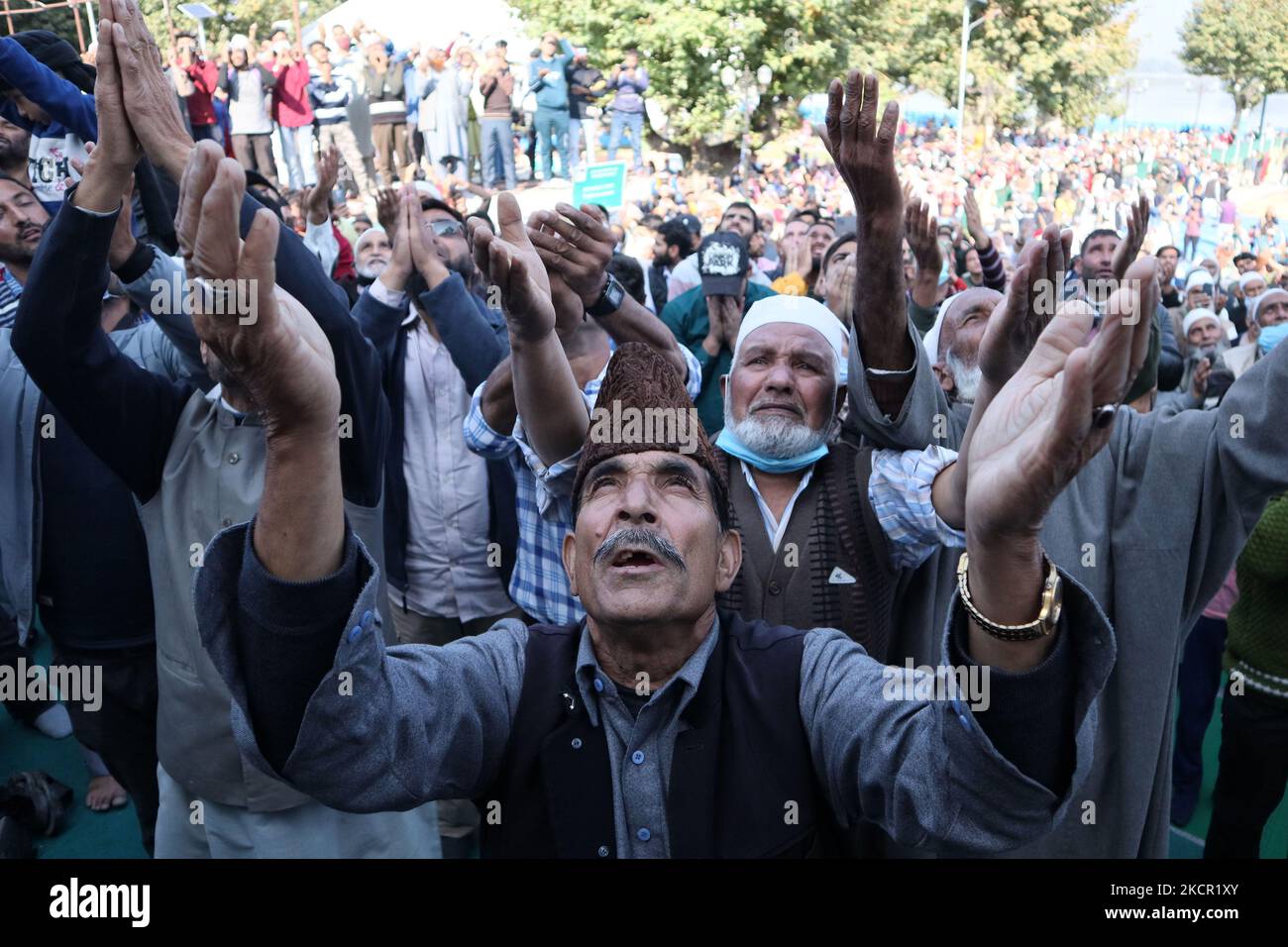 People react as the priest displays Relic which is believed to be the ...