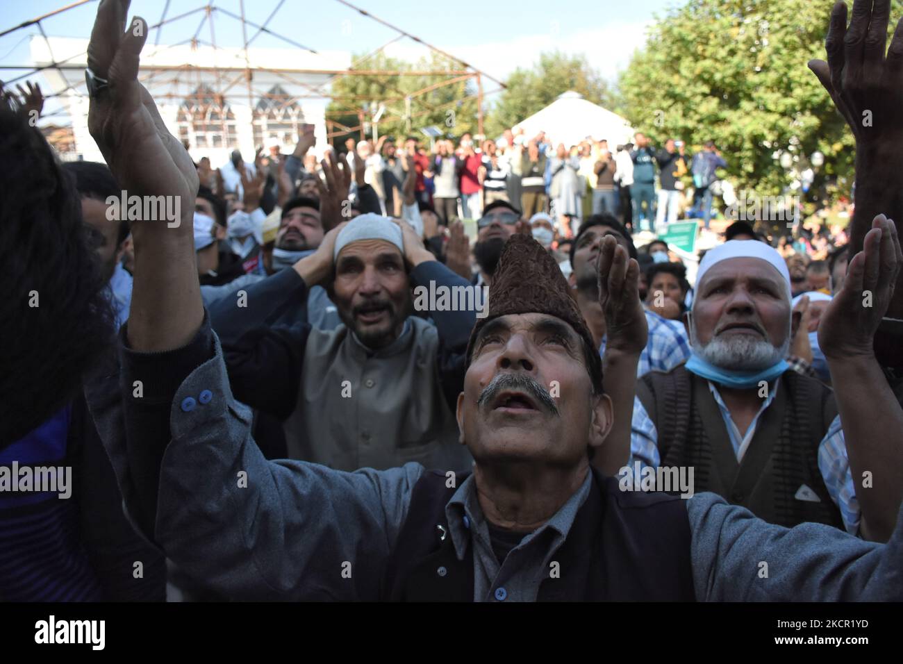 People react as the priest displays Relic which is believed to be the ...