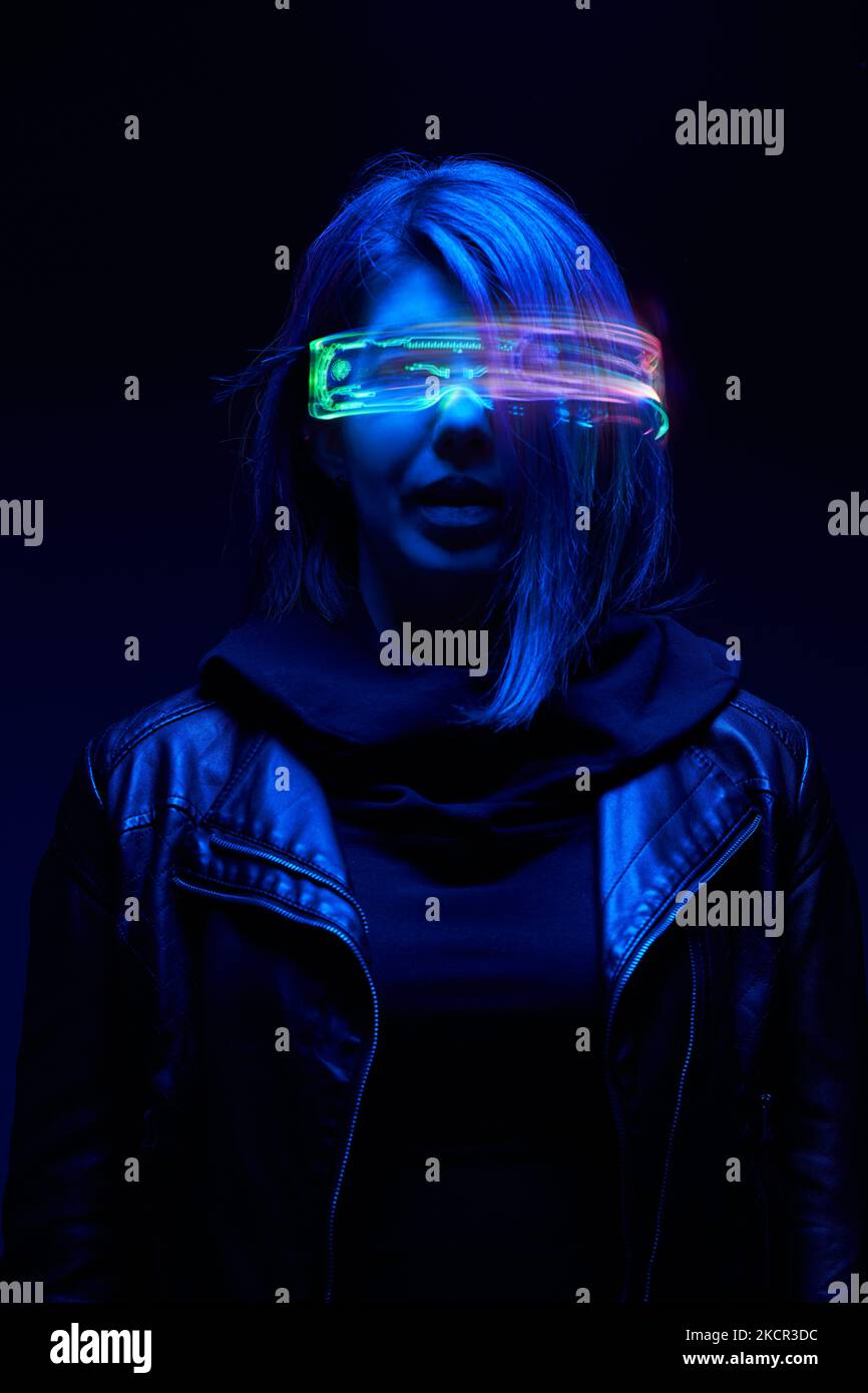 Woman is using augmented reality headset. Concept of virtual, augmented ...