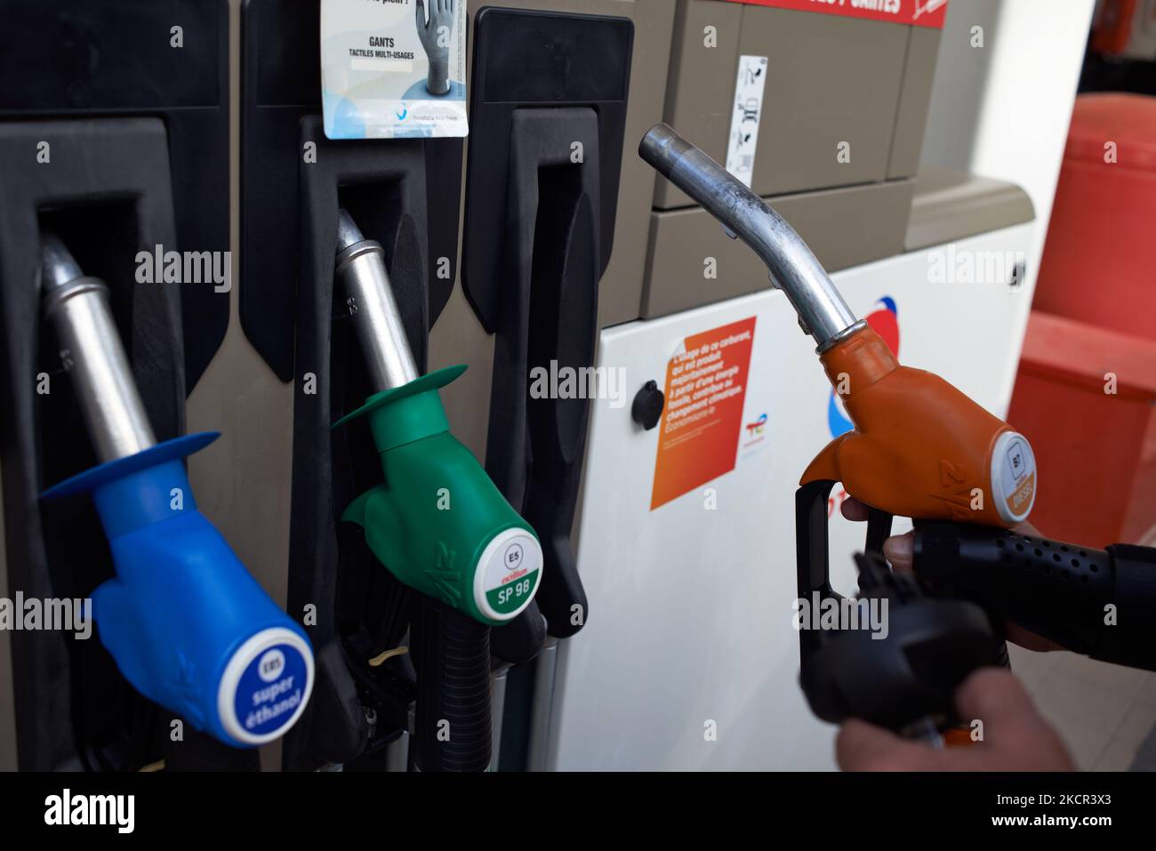 A woman prepares to refill her car. She explained she won't refill ...