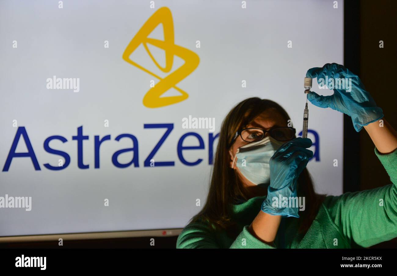 An illustrative image of a person holding a medical syringe and a ...