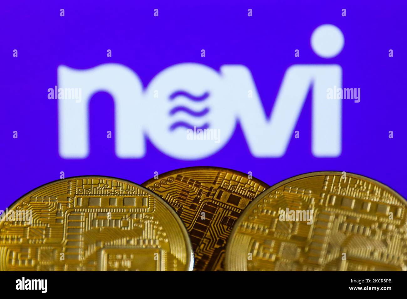 Novi logo displayed on a screen and representation of cryptocurrencies ...