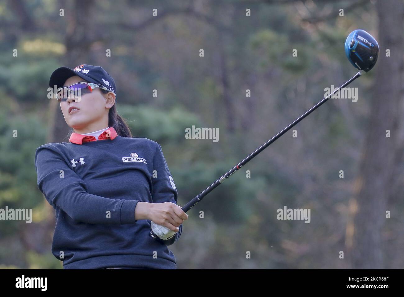 Jung Min Lee of South Korea action on the 2th green during an BMW ...