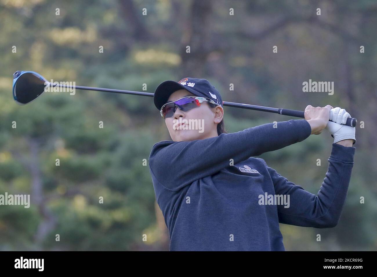 Jung Min Lee of South Korea action on the 2th green during an BMW ...