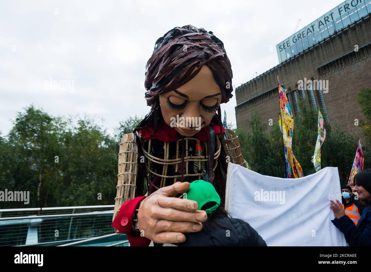 'Little Amal', a giant puppet depicting a Syrian refugee girl, arrives ...