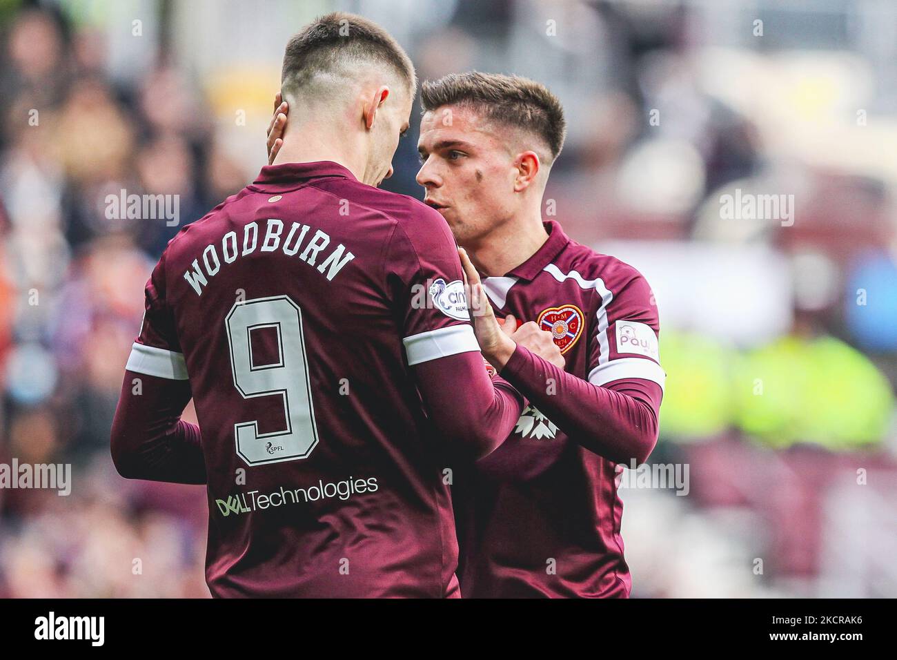 Ben Woodburn of Hearts and Cameron Devlin of Hearts talk during the ...