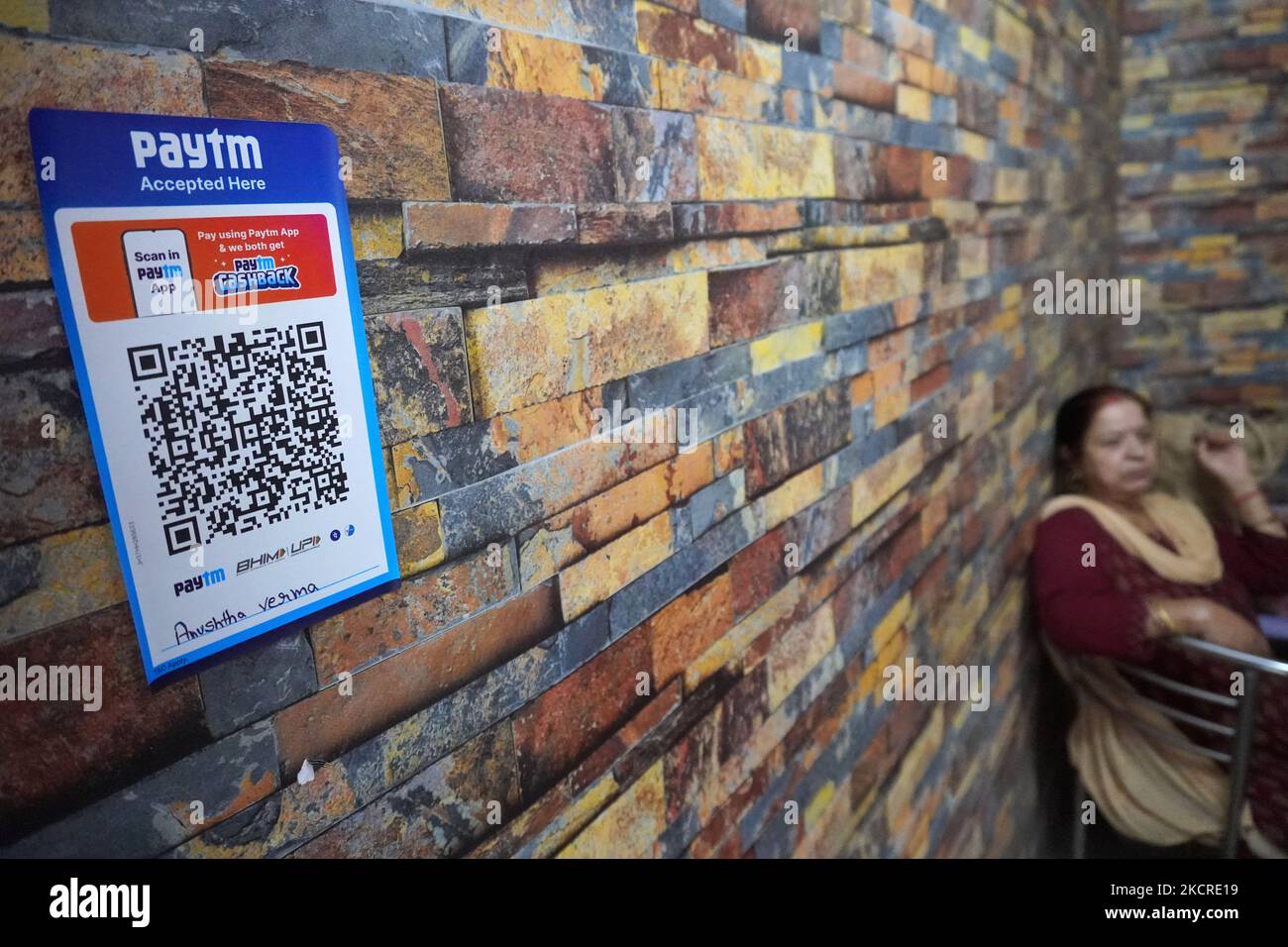 A Paytm QR code is seen outside a food stall in New Delhi, India on ...