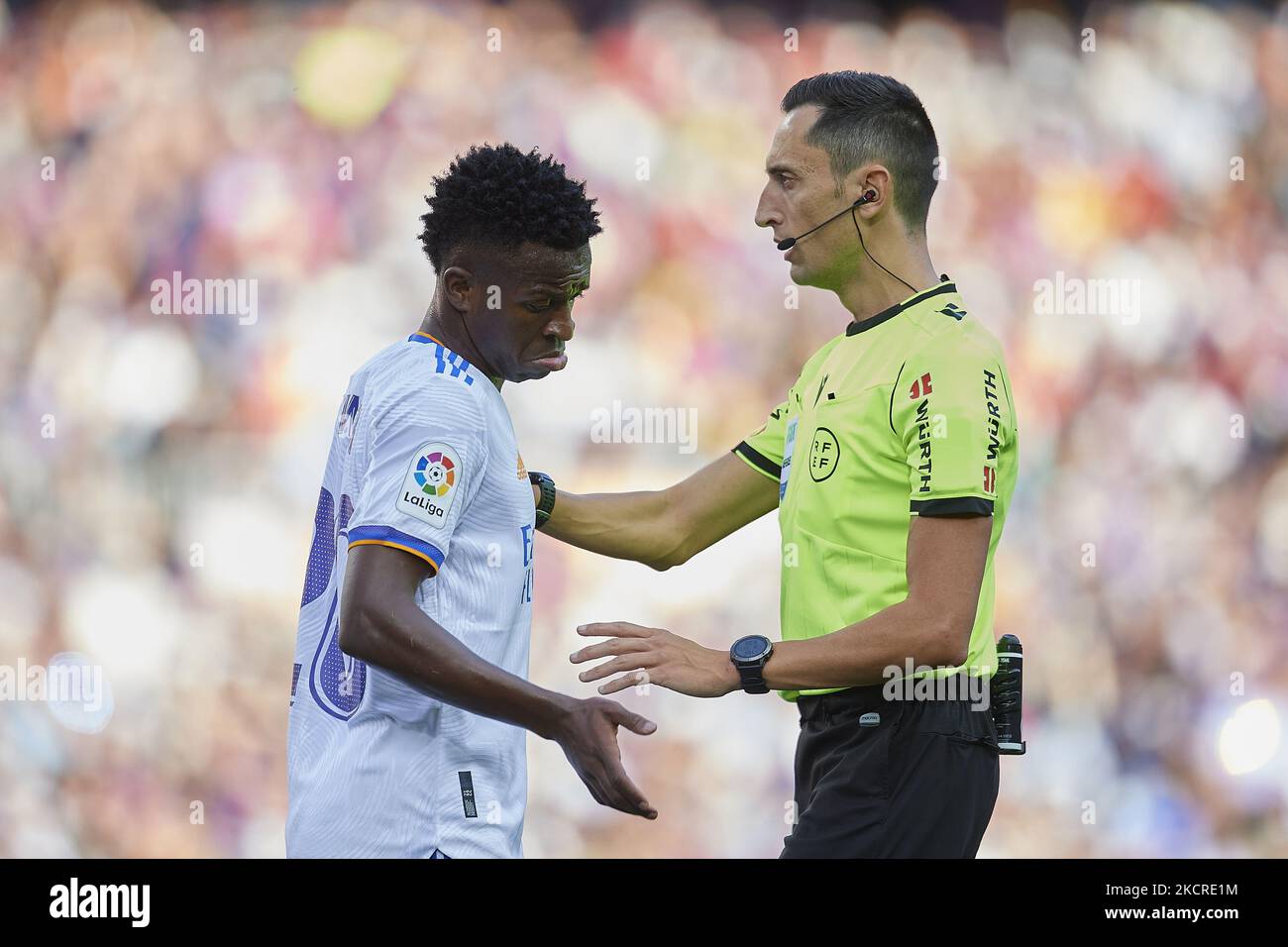 Vinicius Junior of Real Madrid and referee Jose Maria Sanchez Martinez ...