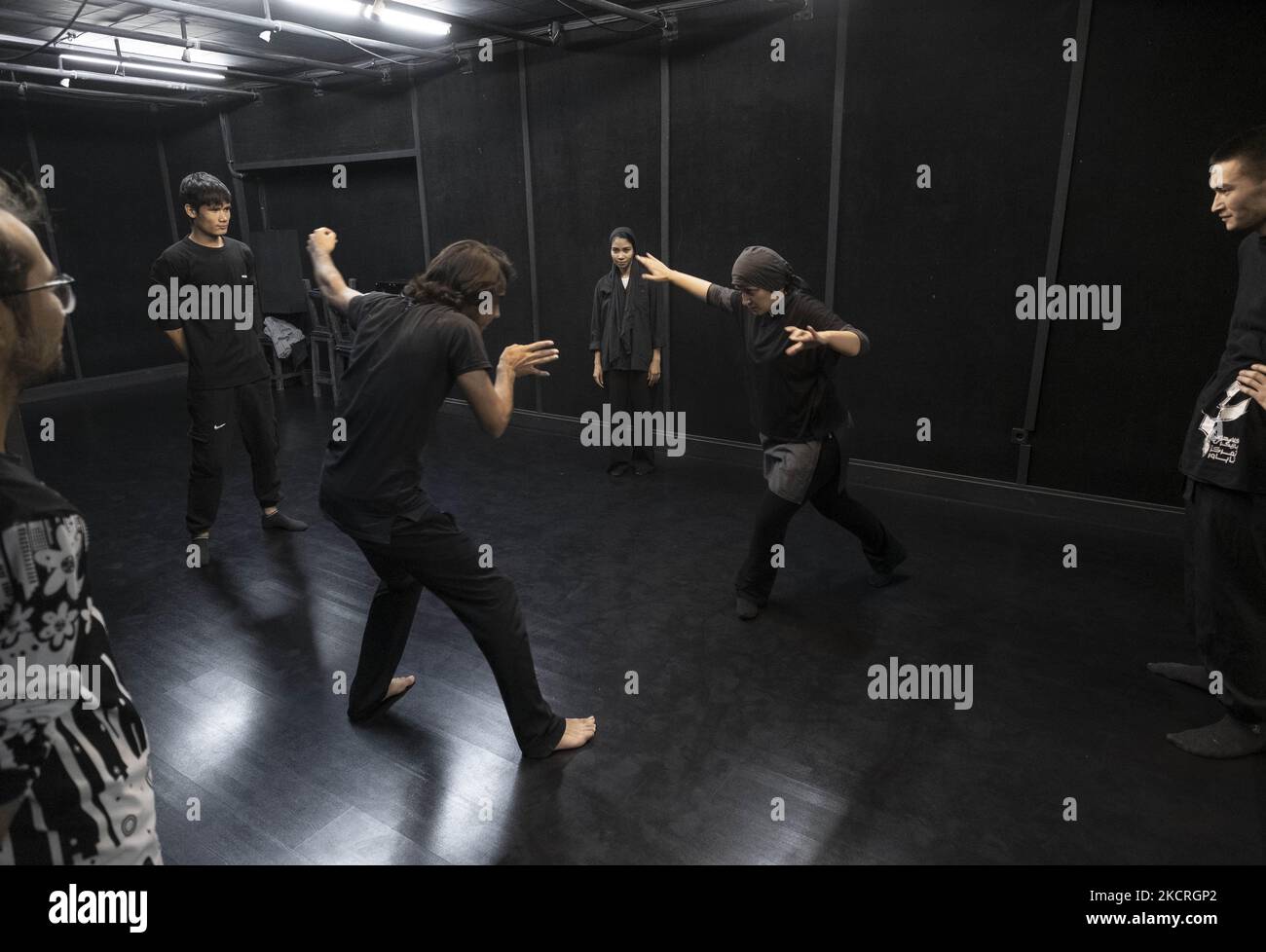 Afghan refugee man Khan-Agha Ahmadi-23 (L) who has born in Iran and ...