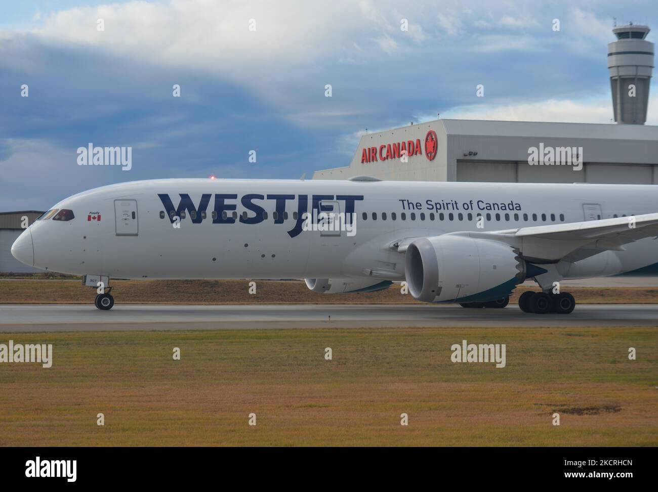 WestJet Airlines plane seen at YYC Calgary International Airport. On ...