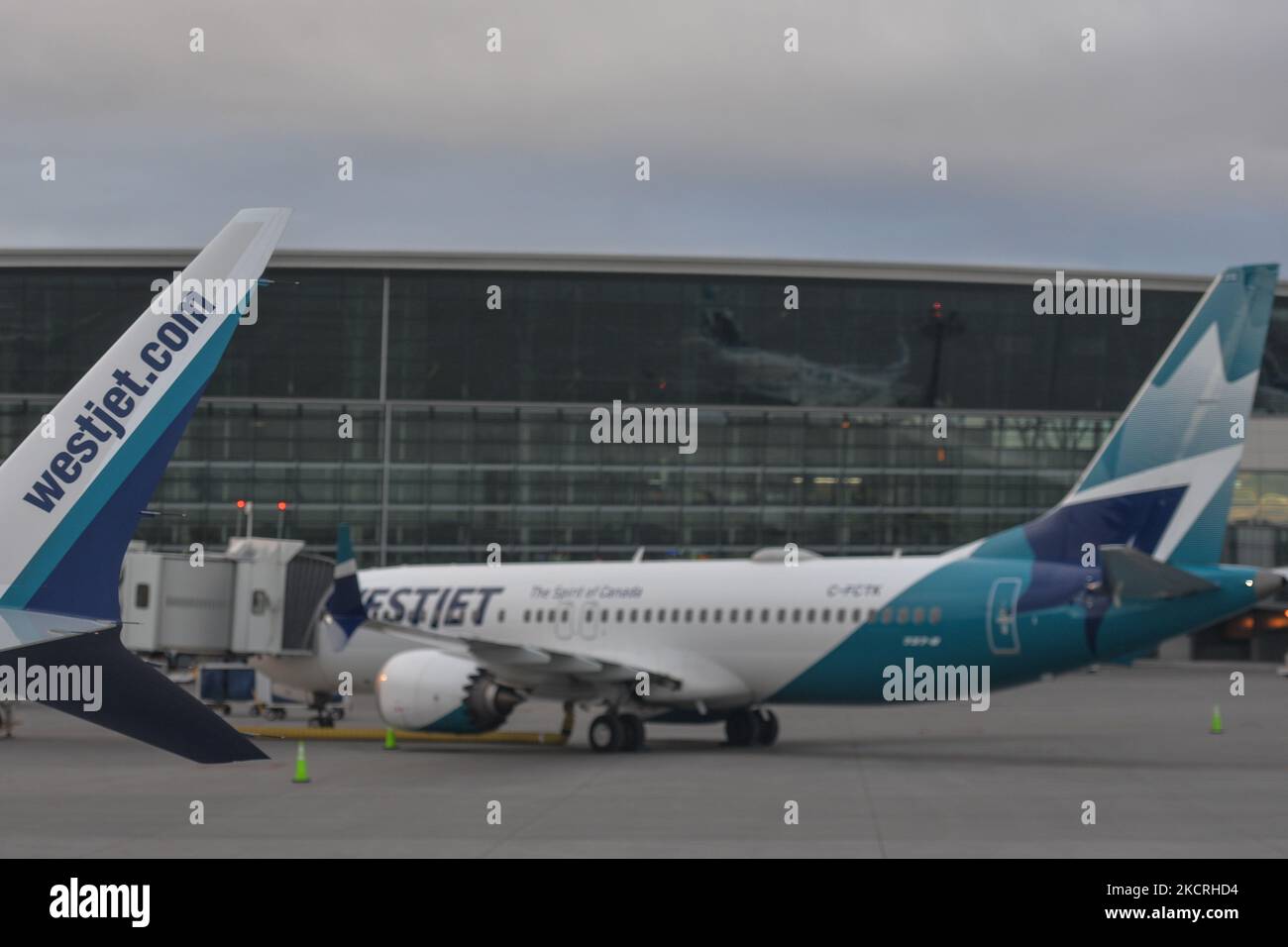 WestJet Airlines plane seen at YYC Calgary International Airport. On ...