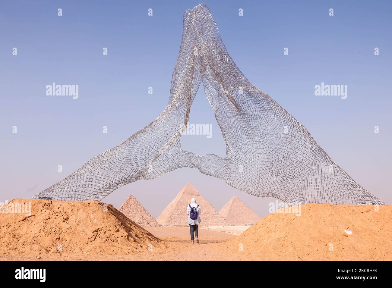 An installation titled Together on display at the Great Pyramids of ...