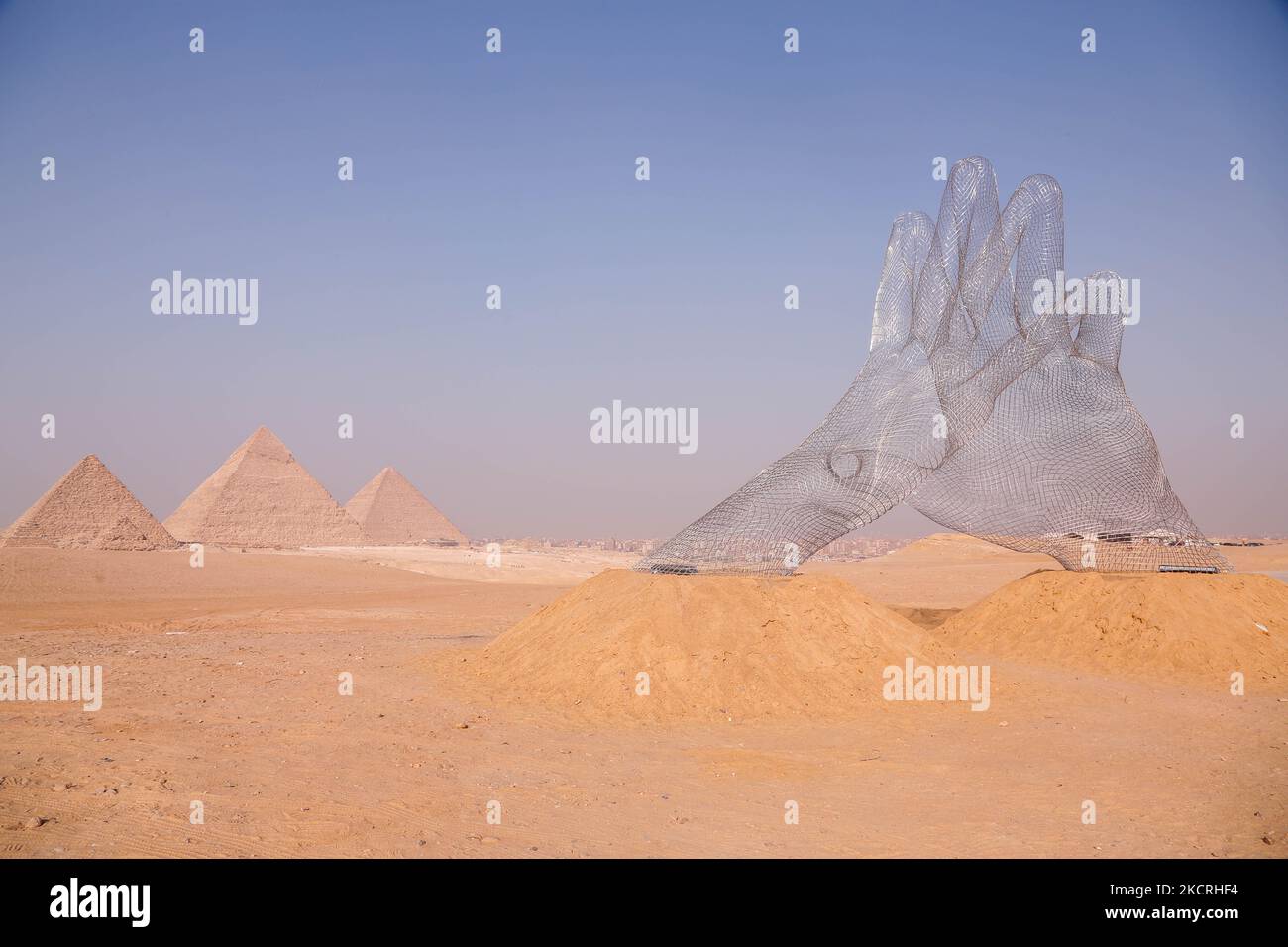 An installation titled Together on display at the Great Pyramids of ...