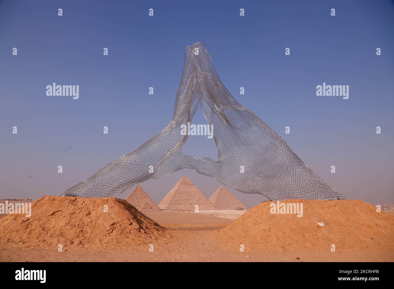 An installation titled Together on display at the Great Pyramids of ...