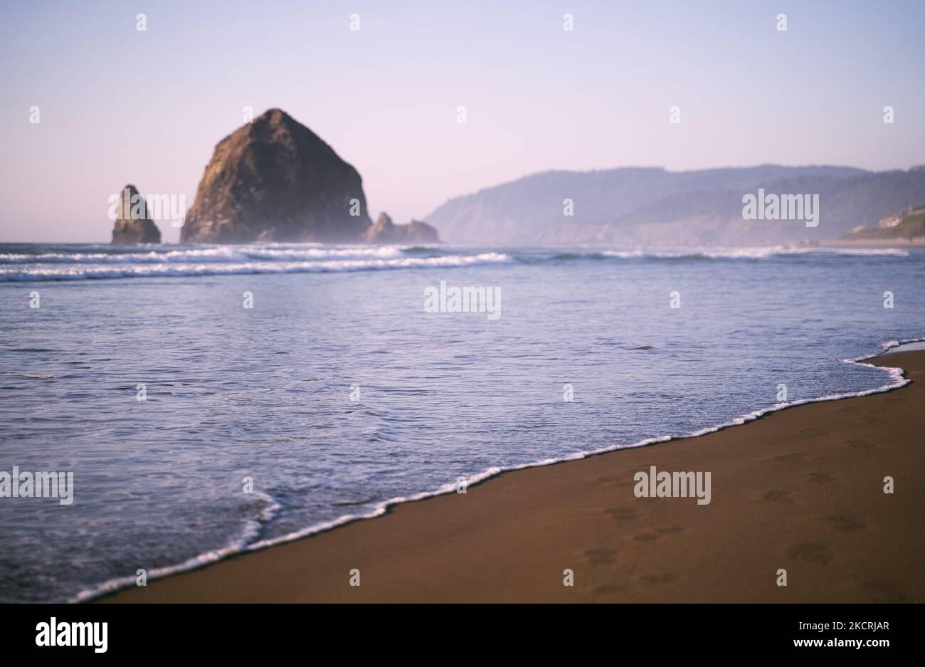 Haystack Rock at Cannon Beach Oregon right before sunset Stock Photo ...