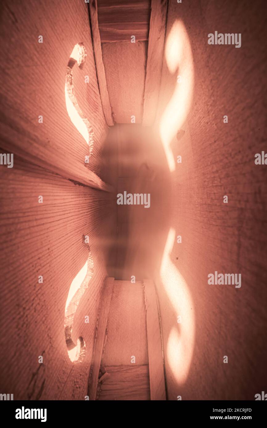 Wooden violin view from inside. Interior of violin. Macro view of a ...