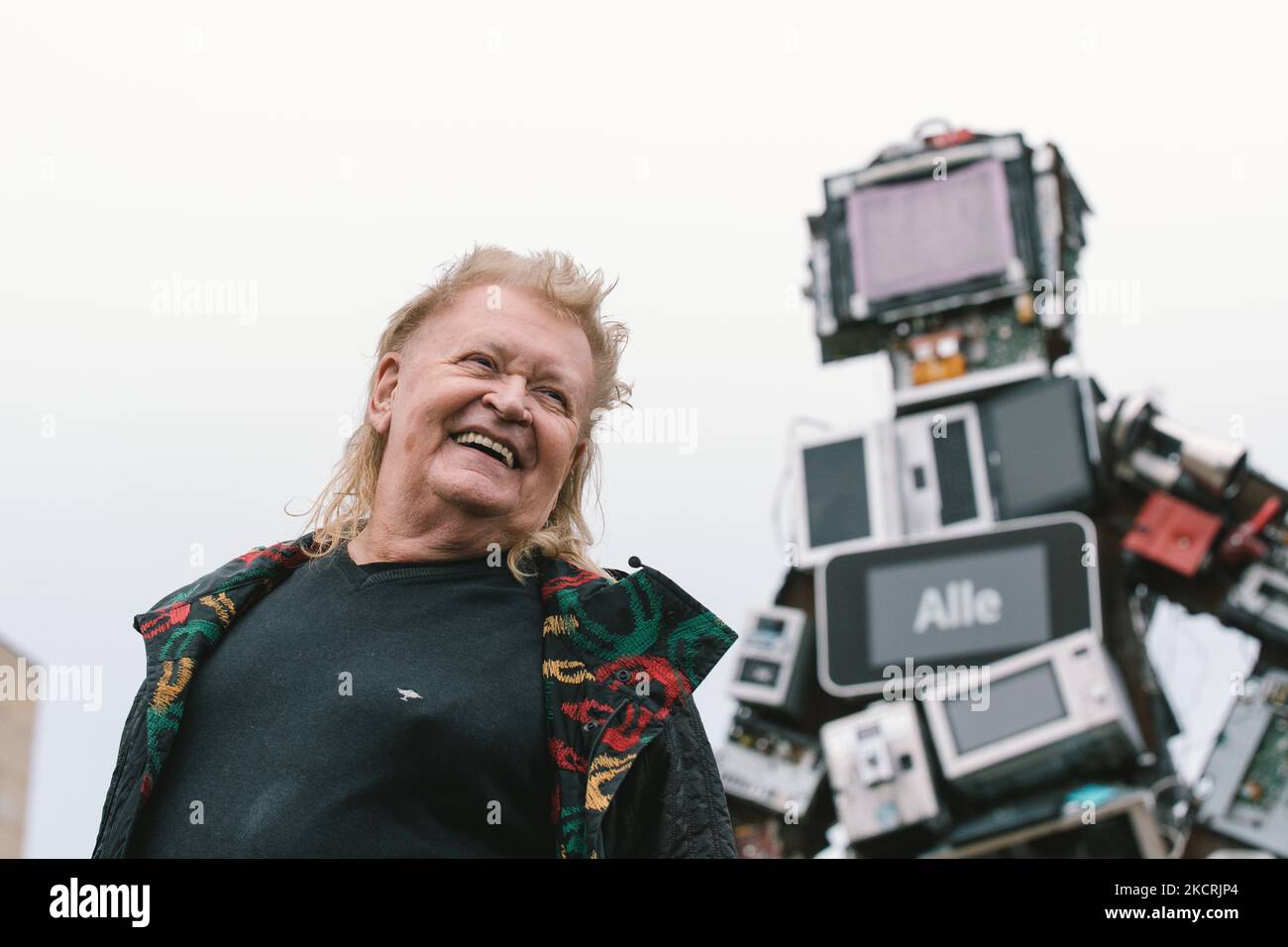 artist HA schult poses in front of his new installation of "Wertgigant ...
