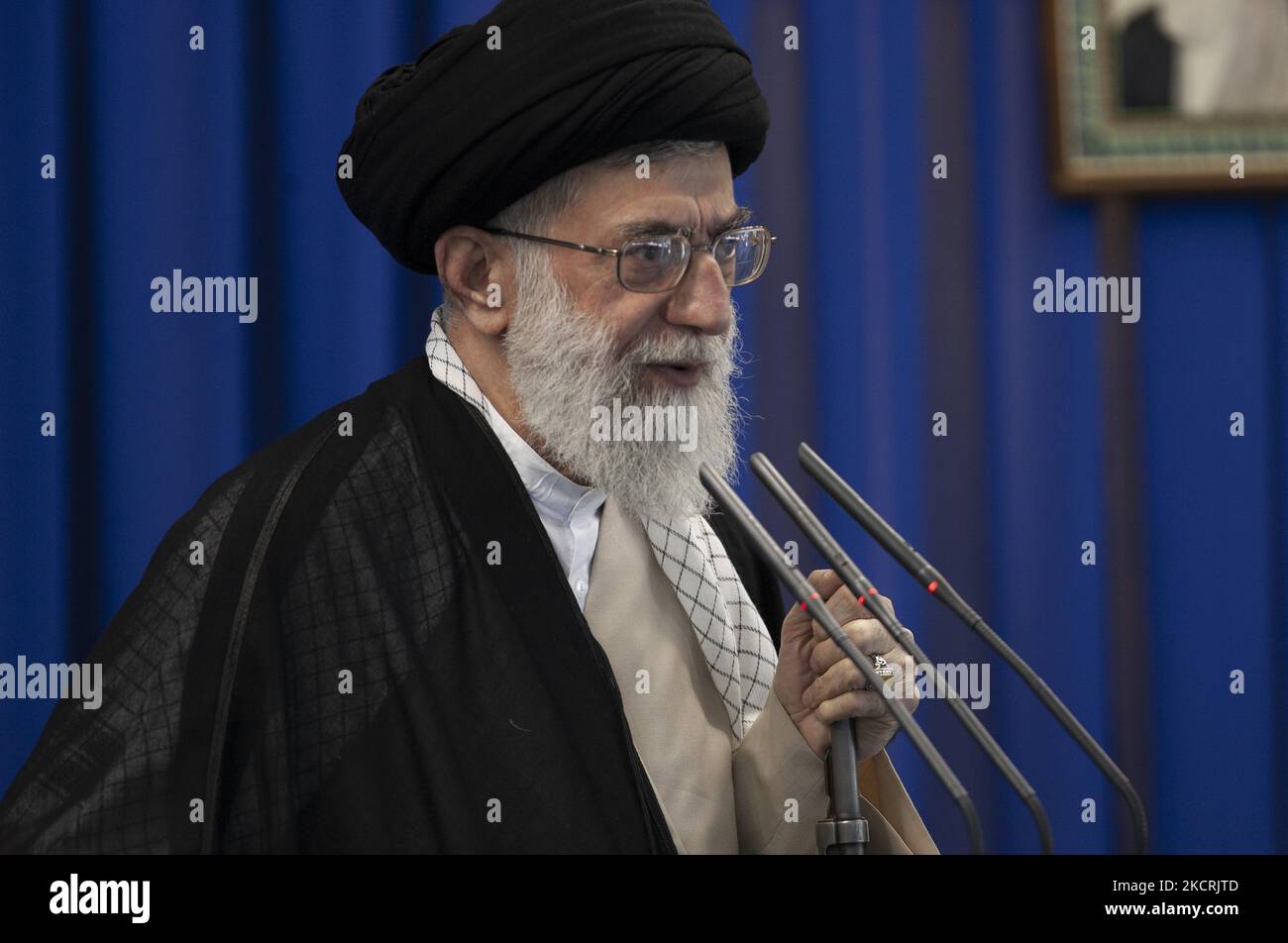 Iran's Supreme Leader Ayatollah Ali Khamenei holds a gun as he speaks ...