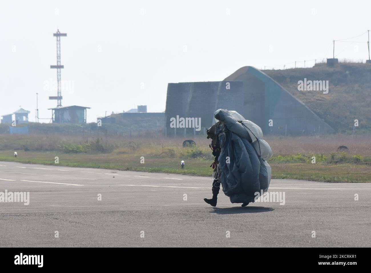 Indian paratroopers performs during a re-enactment of the Indian army's ...