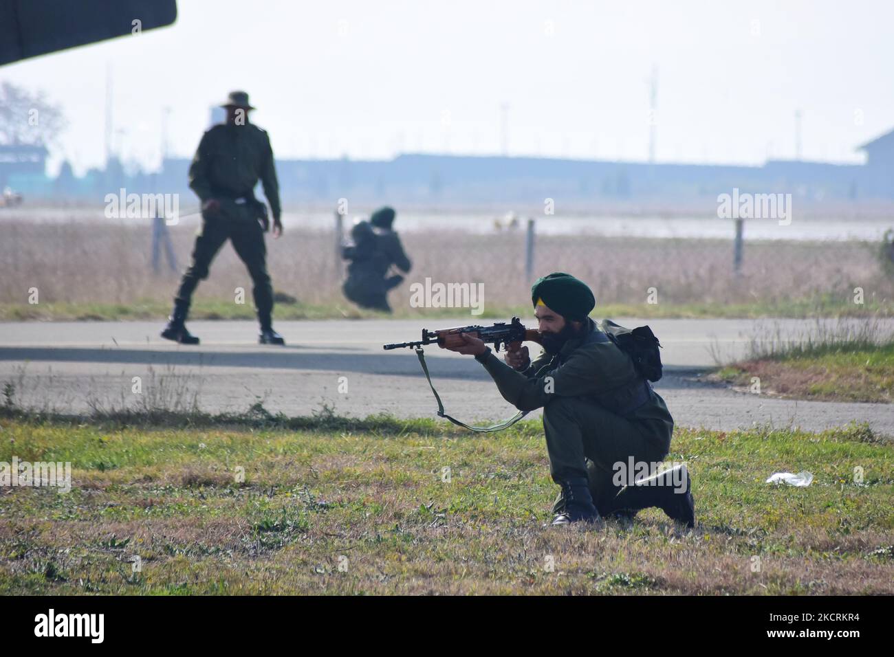 Indian paramilitary troops perform during a re-enactment of the Indian ...