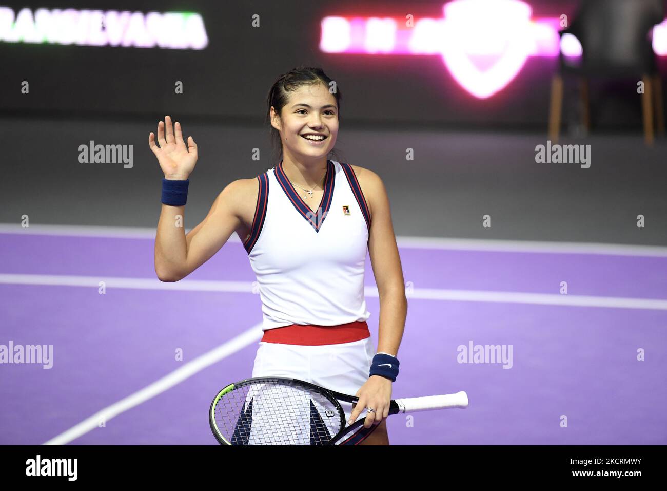 Emma Raducanu waving at the public after scoring against Polona Hercog ...