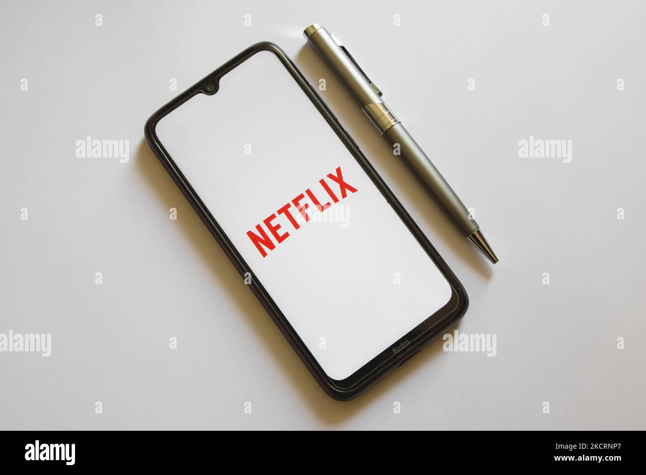 In this photo illustration a Netflix logo is display on a smartphone ...
