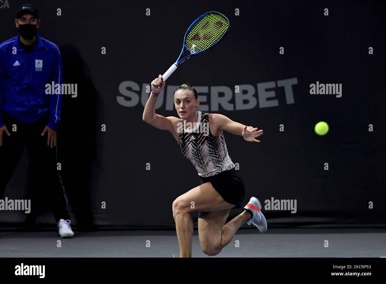 Ana Bogdan in action - receiving the ball during her match against Emma ...