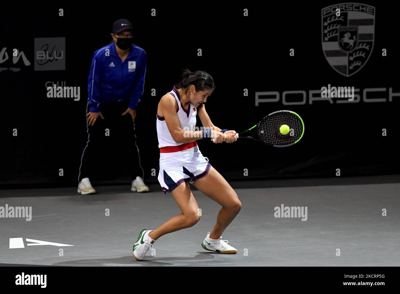 Emma Raducanu in action - receiving the ball during her match against ...