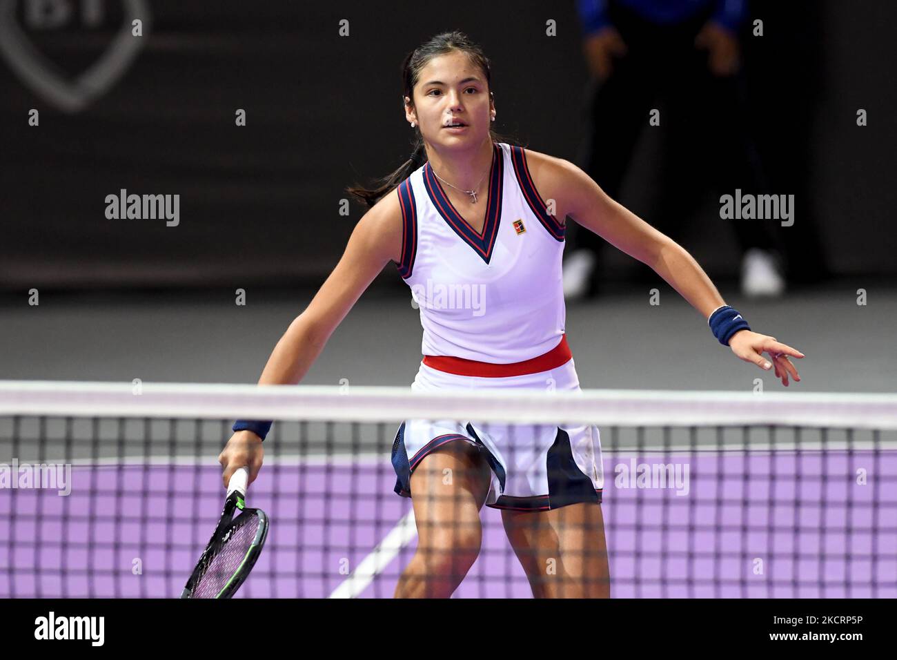 Emma Raducanu in action - receiving the ball during her match against ...