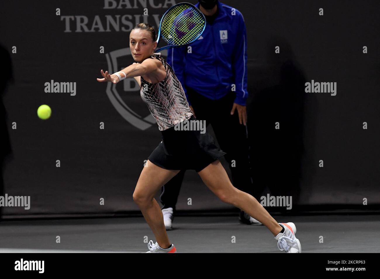 Ana Bogdan in action - receiving the ball during her match against Emma ...