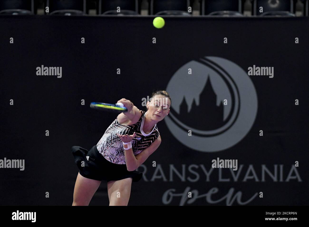 Ana Bogdan in action - serving the ball during her match against Emma ...