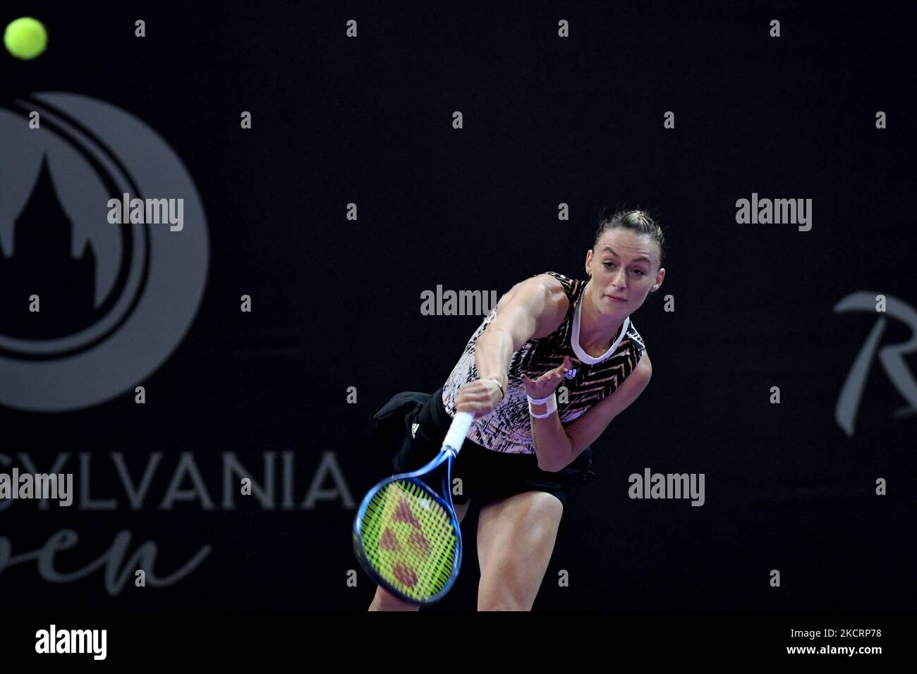 Ana Bogdan in action - serving the ball during her match against Emma ...
