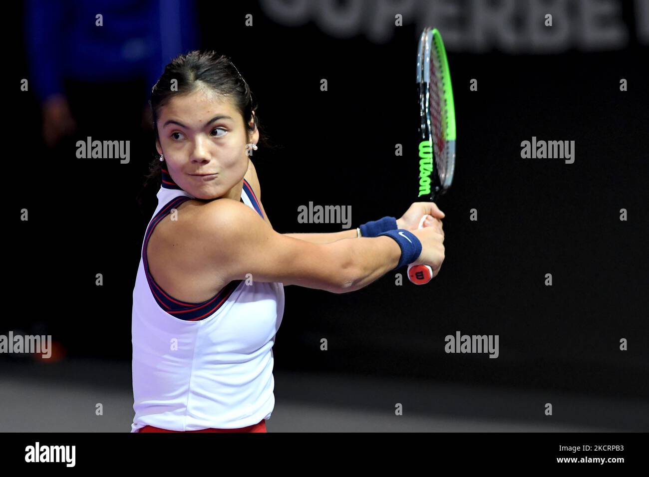 Emma Raducanu in action - receiving the ball during her match against ...