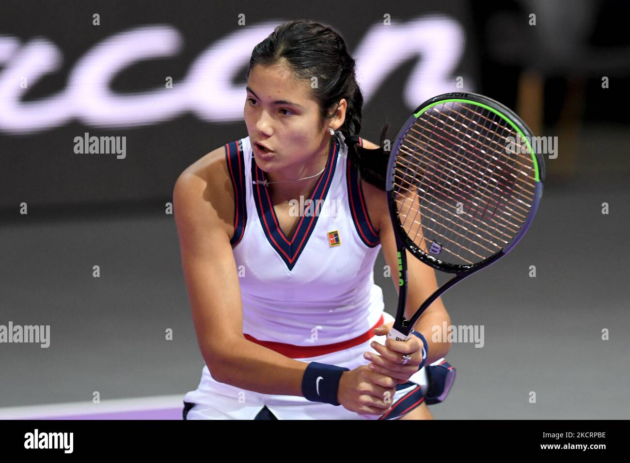 Emma Raducanu in action - receiving the ball during her match against ...