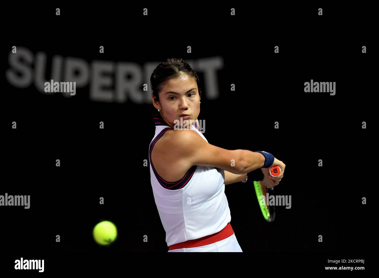 Emma Raducanu in action - receiving the ball during her match against ...