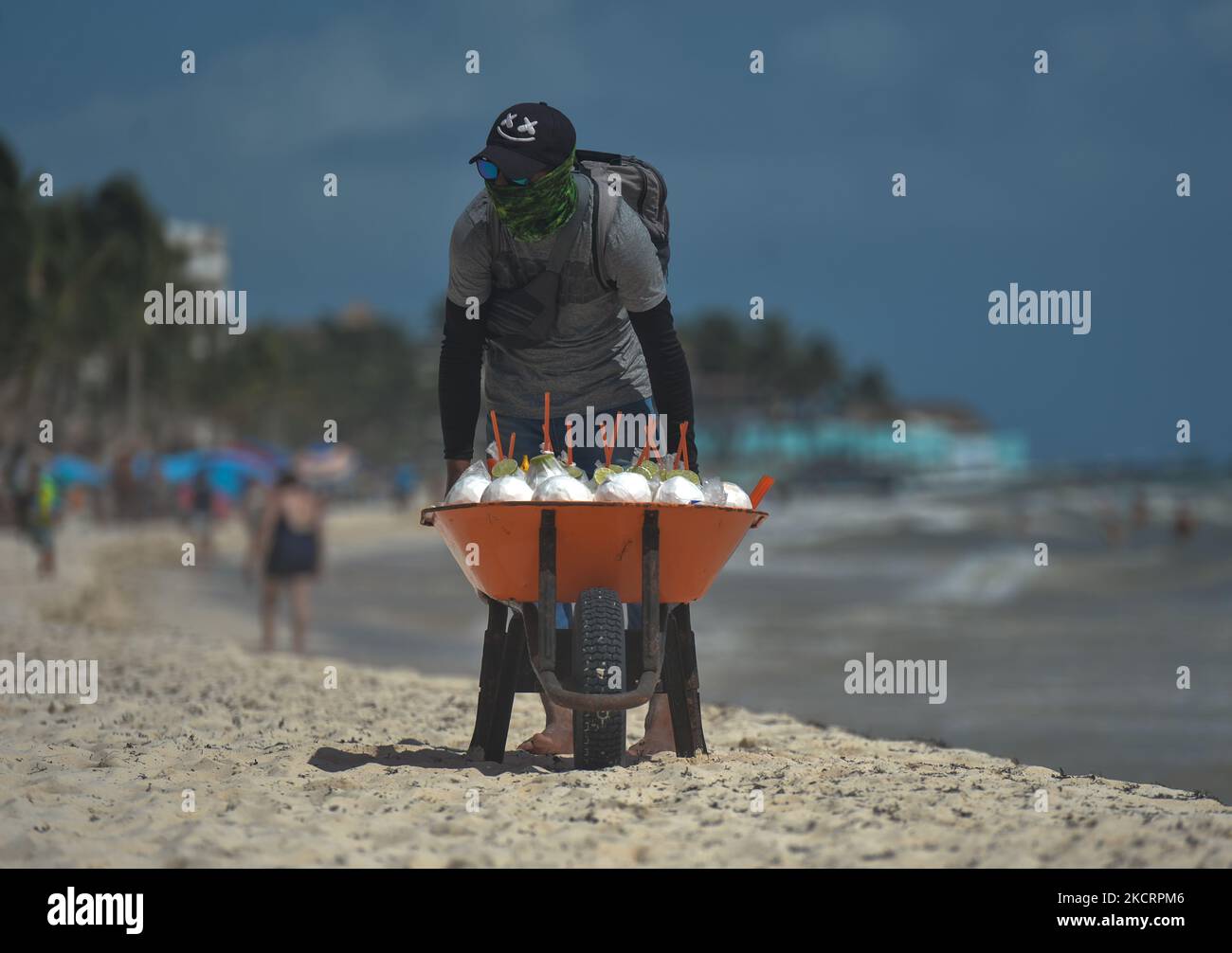 Coconut vendor seen on a beach in Playa Del Carmen. On Thursday, 28 ...
