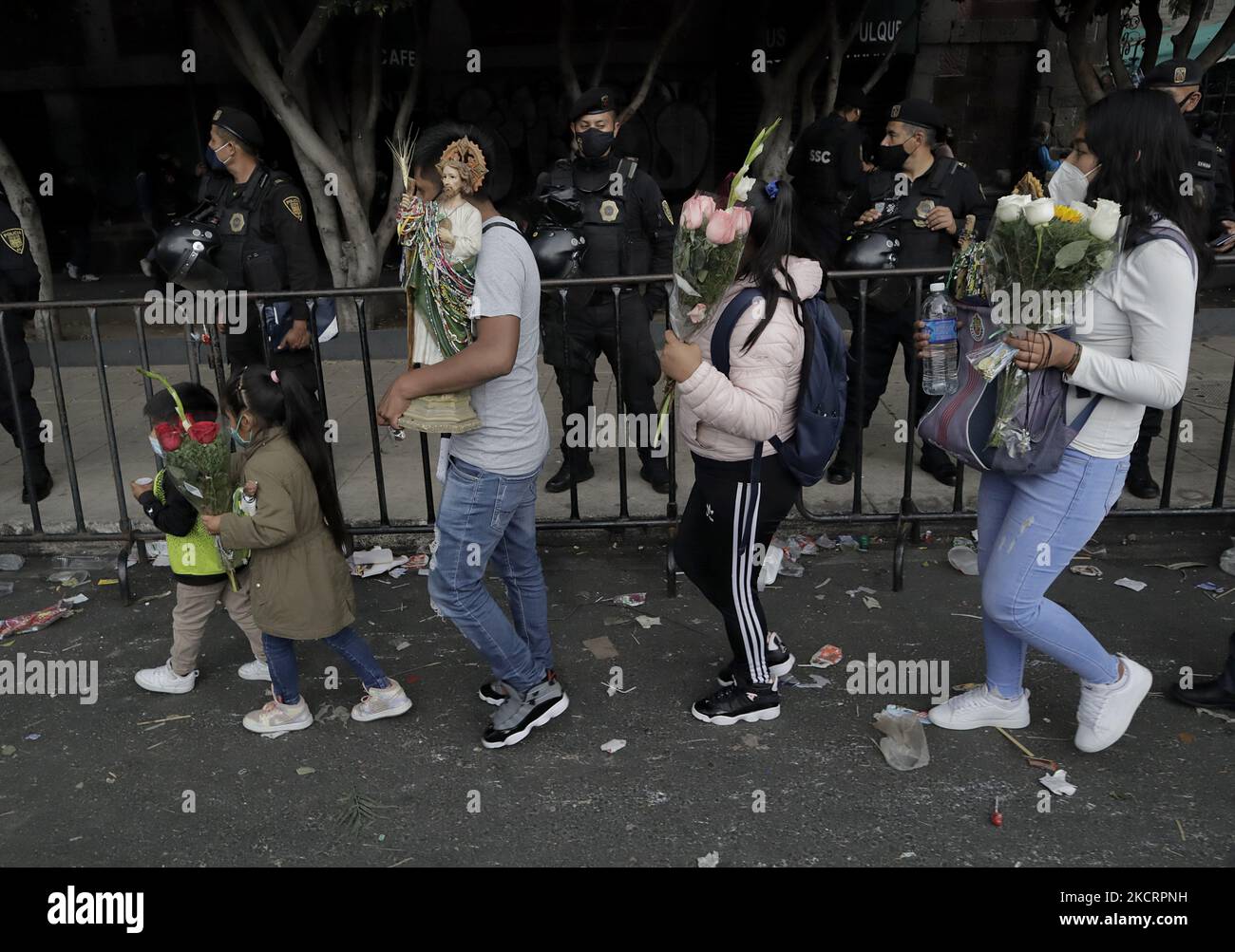 Believers of St. Jude Thaddeus outside the Church of St. Hippolytus ...