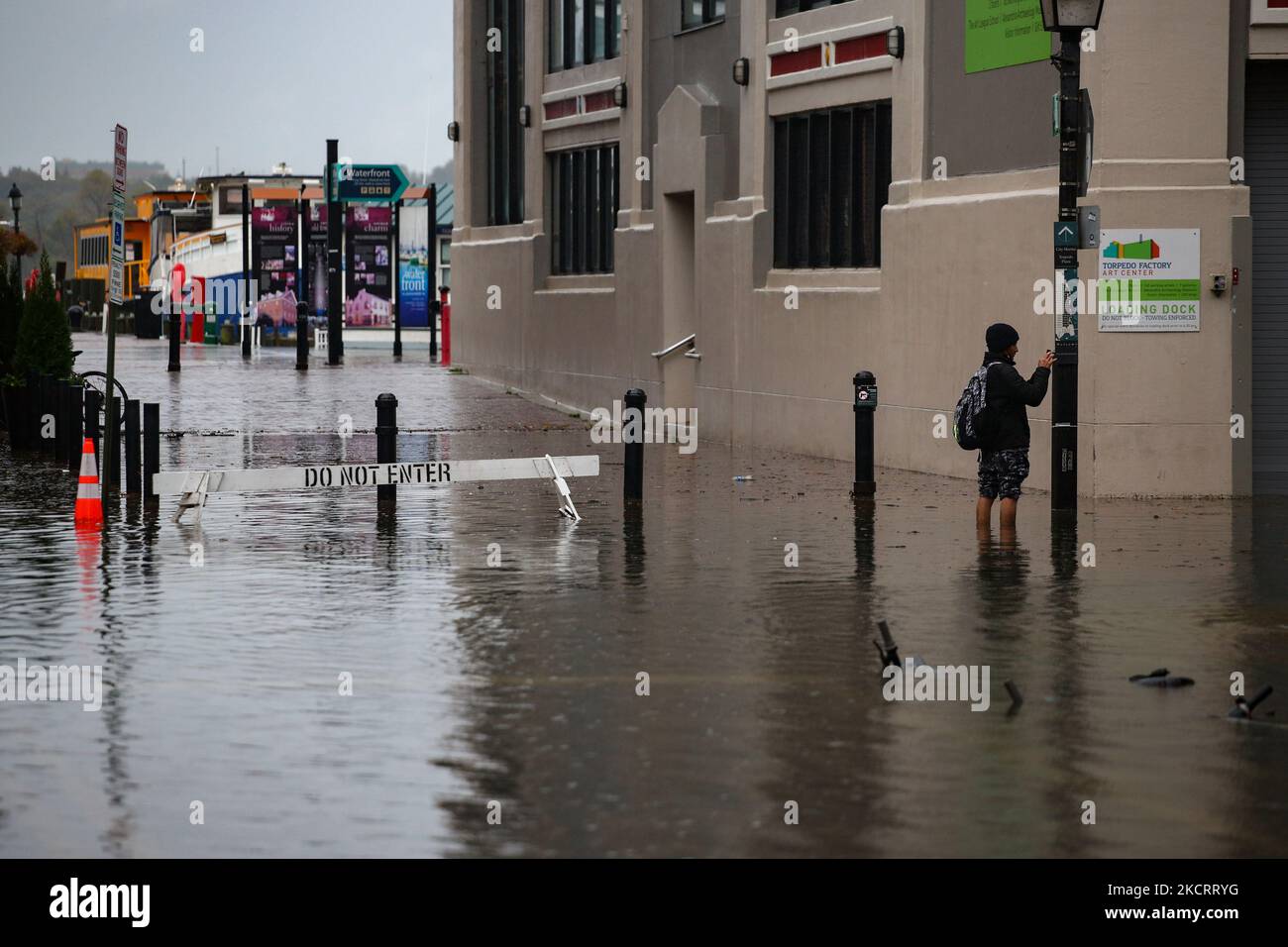 The Potomac River floods into streets in Old Town Alexandria, Virginia ...