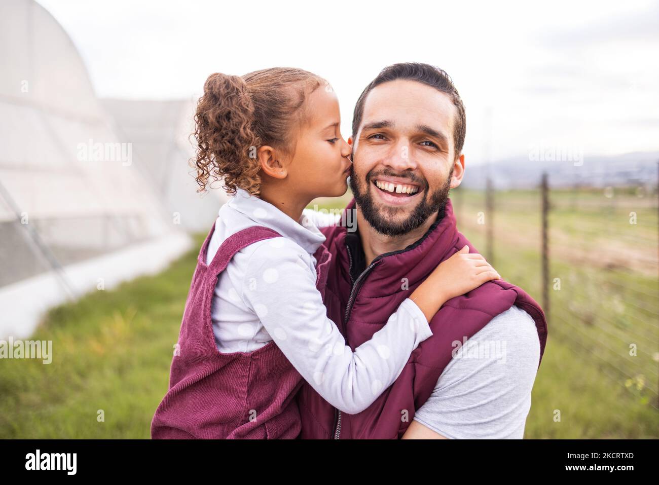 Farm, father and child kiss dad cheek for bonding and affection on ...