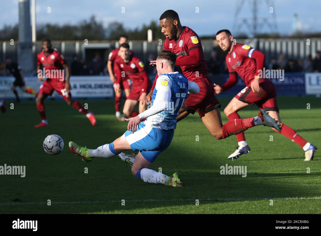 Barrow's Josh Kay in action with Rochdale's Jeriel Dorsett during the ...
