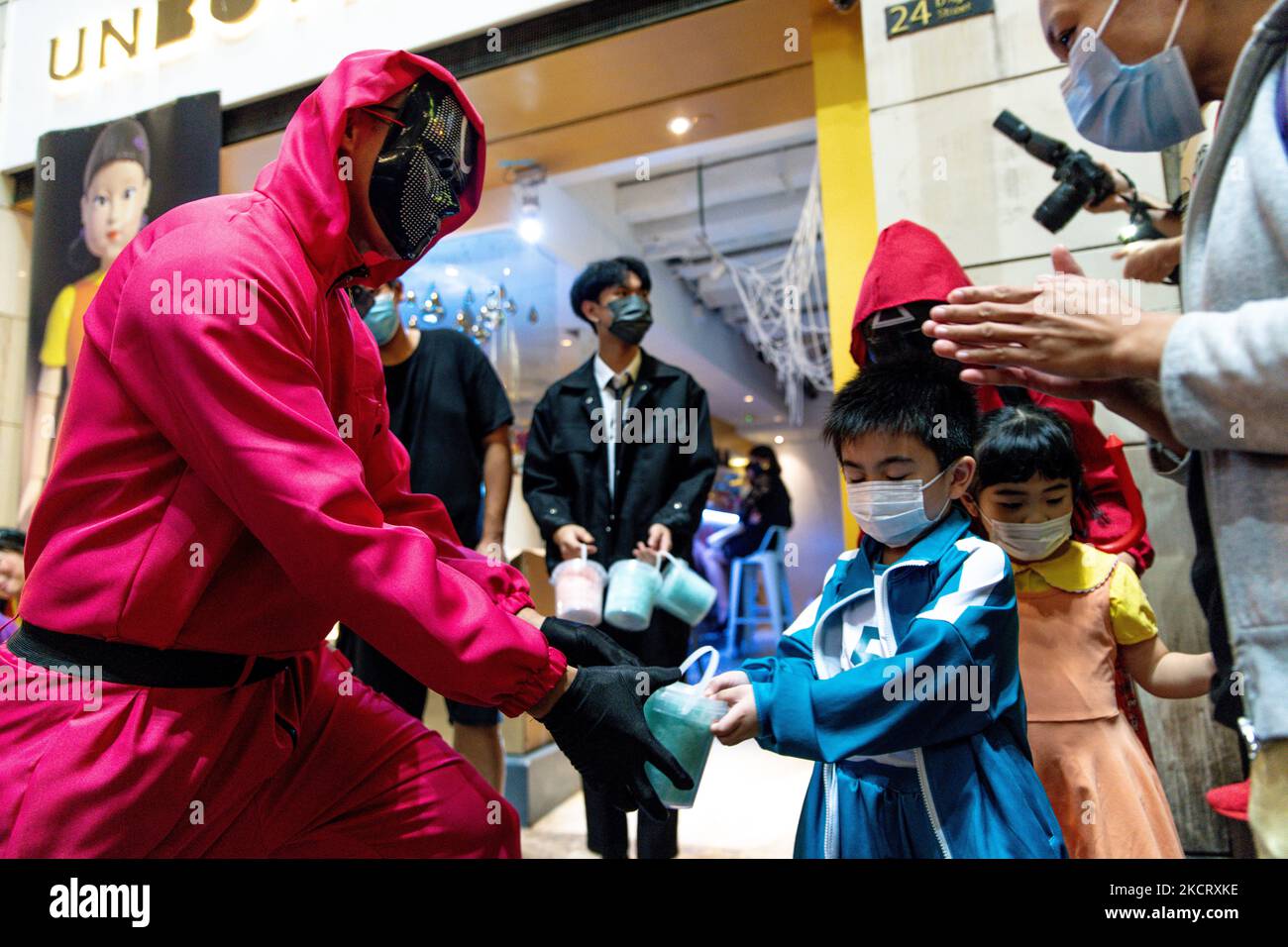 A man disguised as a security guard of the Squid Game Korean drama ...