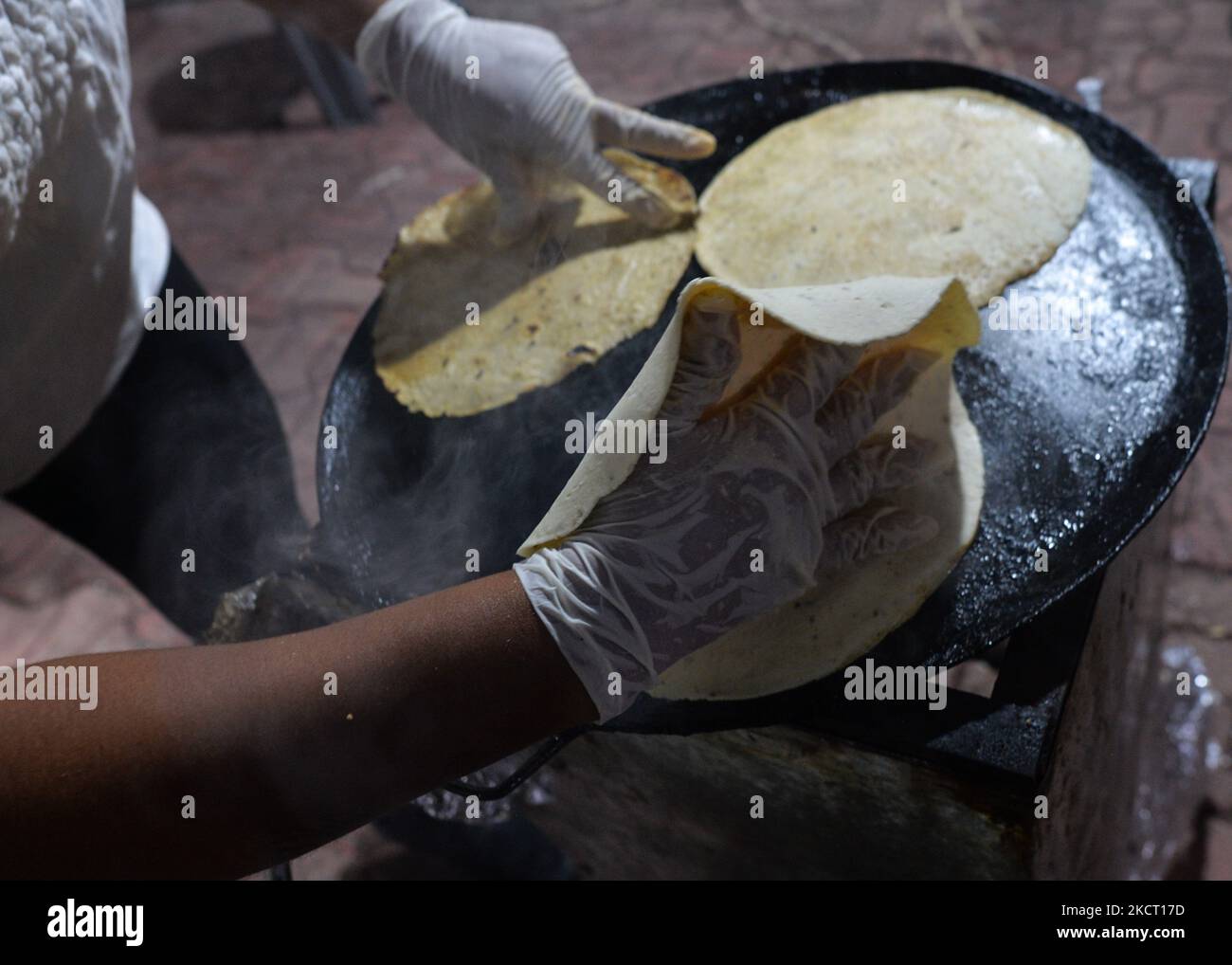 Preparation of a traditional Memela dish seen in the center of Playa ...