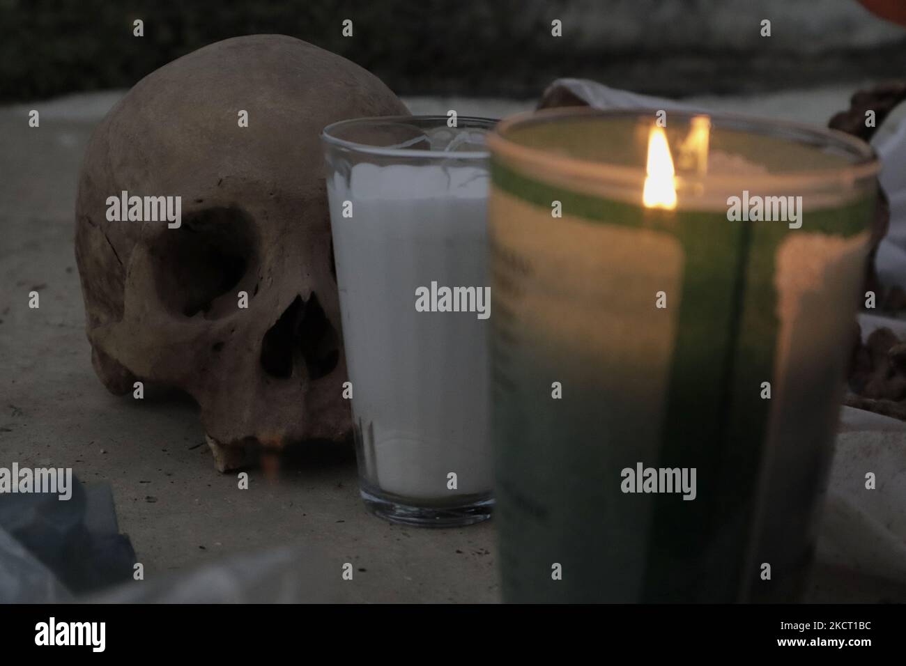 A skull inside a box in the cemetery of Pomuch, an indigenous Mayan ...