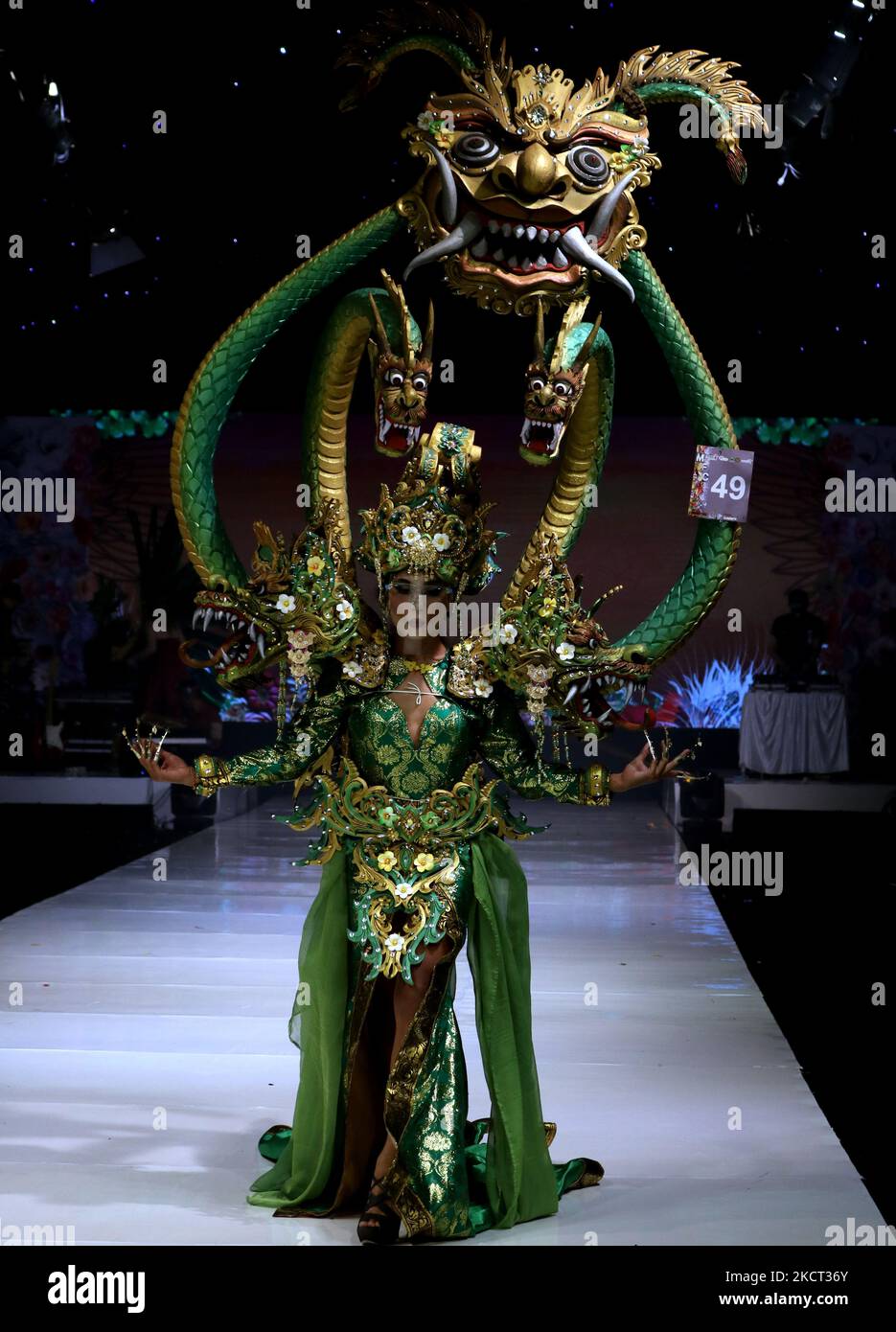 A model showing her fashion design to the audience of Malang Flower ...