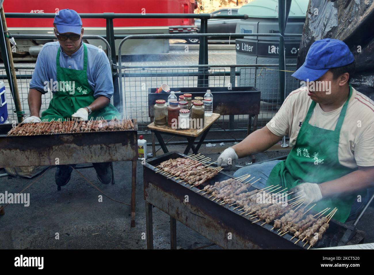 Apron man cooks on grill hi-res stock photography and images - Alamy