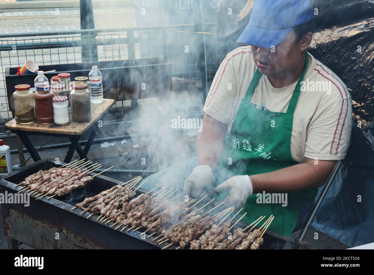 Chinese asian man making chicken hi-res stock photography and images - Alamy