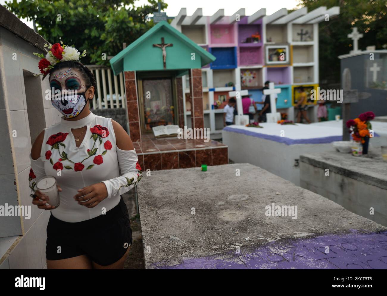 Woman wearing Catrina make up seen inside the municipal cemetery of ...
